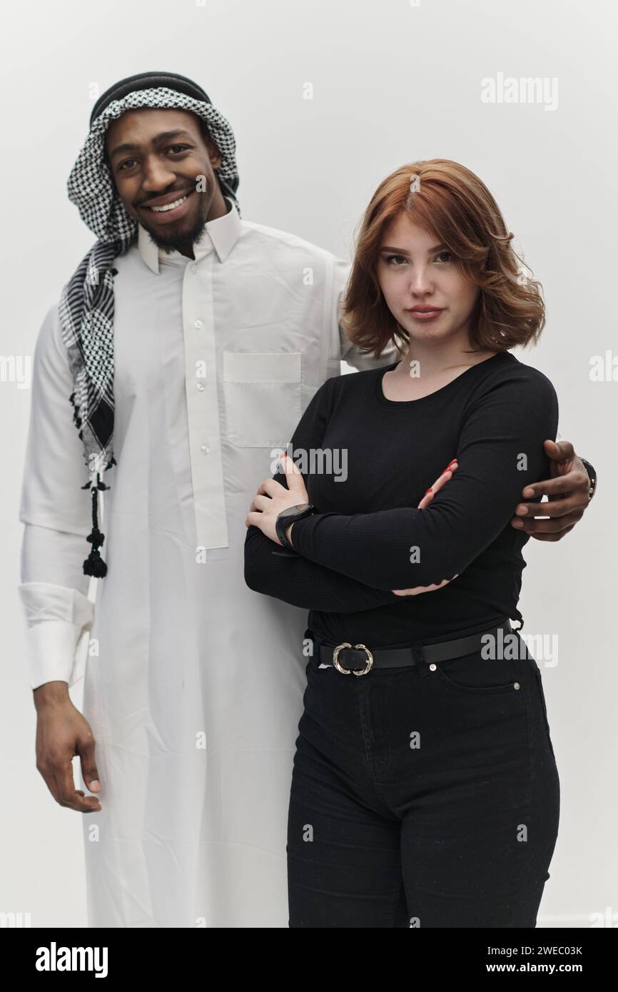 Muslim entrepreneur and a contemporary red-haired girl strike a pose ...