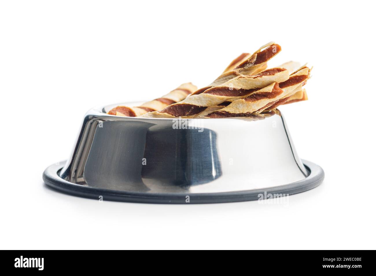 Dog food. Snack sticks for dogs in bowl isolated on the white ...