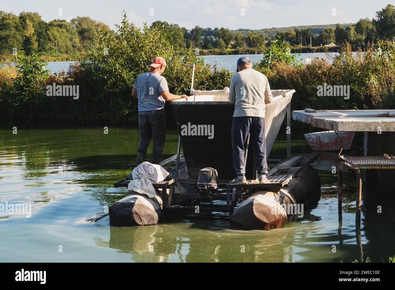 Fish farm feeding hi-res stock photography and images - Alamy