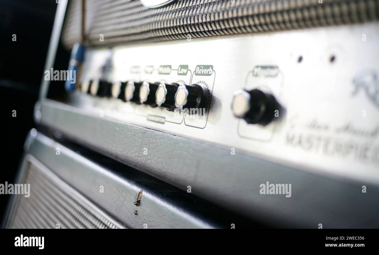 Close up electric guitar amplifier. Master regulator knob, volume level ...