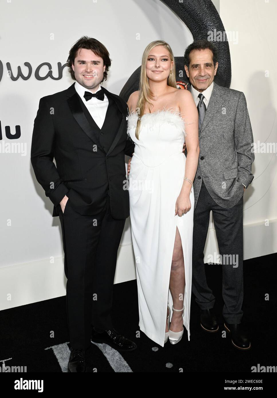 Travel, left, Josie Lynn Adams and Tony Shalhoub attend the premiere of ...