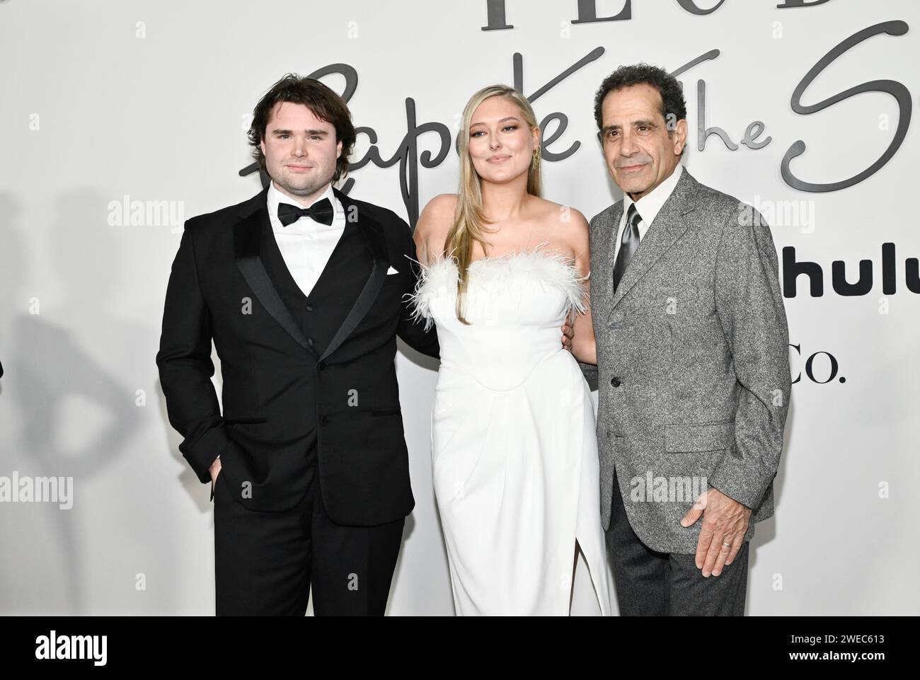 Travel, left, Josie Lynn Adams and Tony Shalhoub attend the premiere of ...