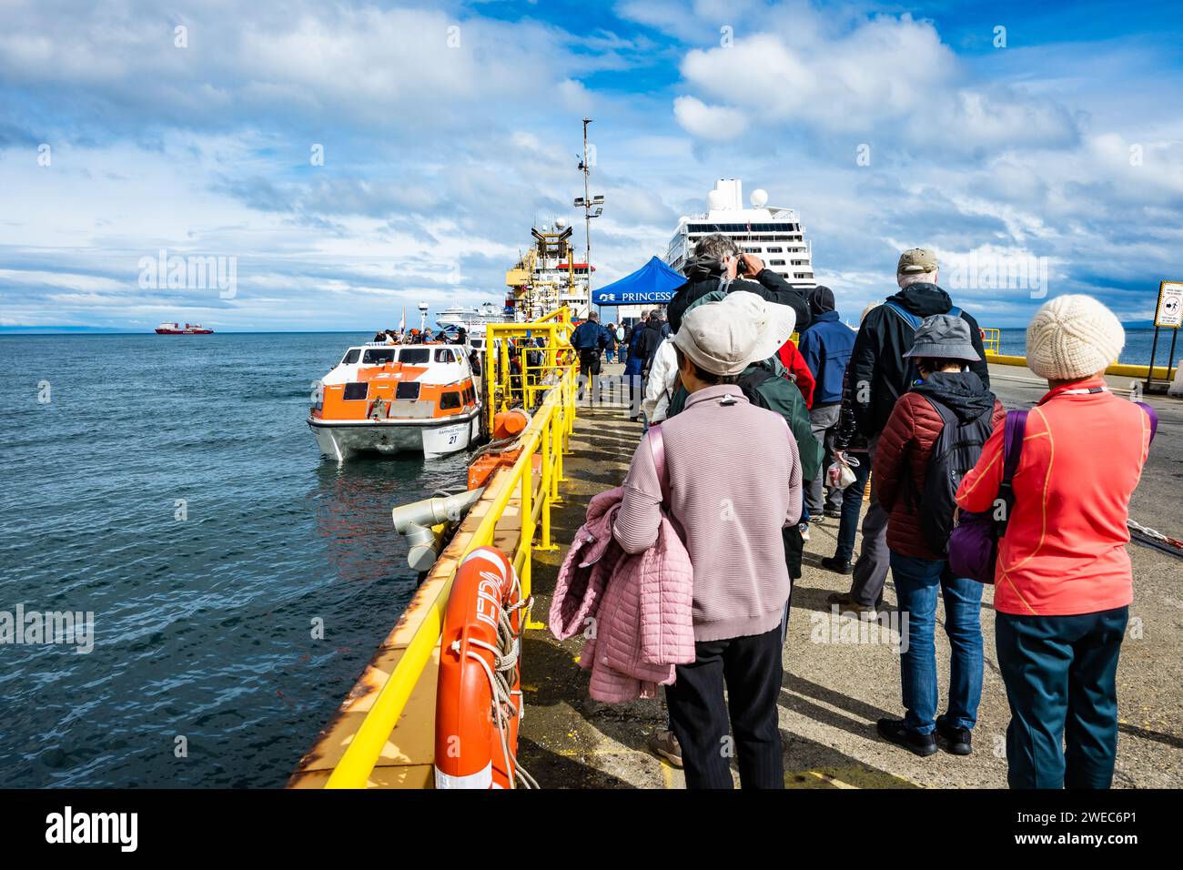 Cruise ship passengers are transported by tender boat to port. Punta ...