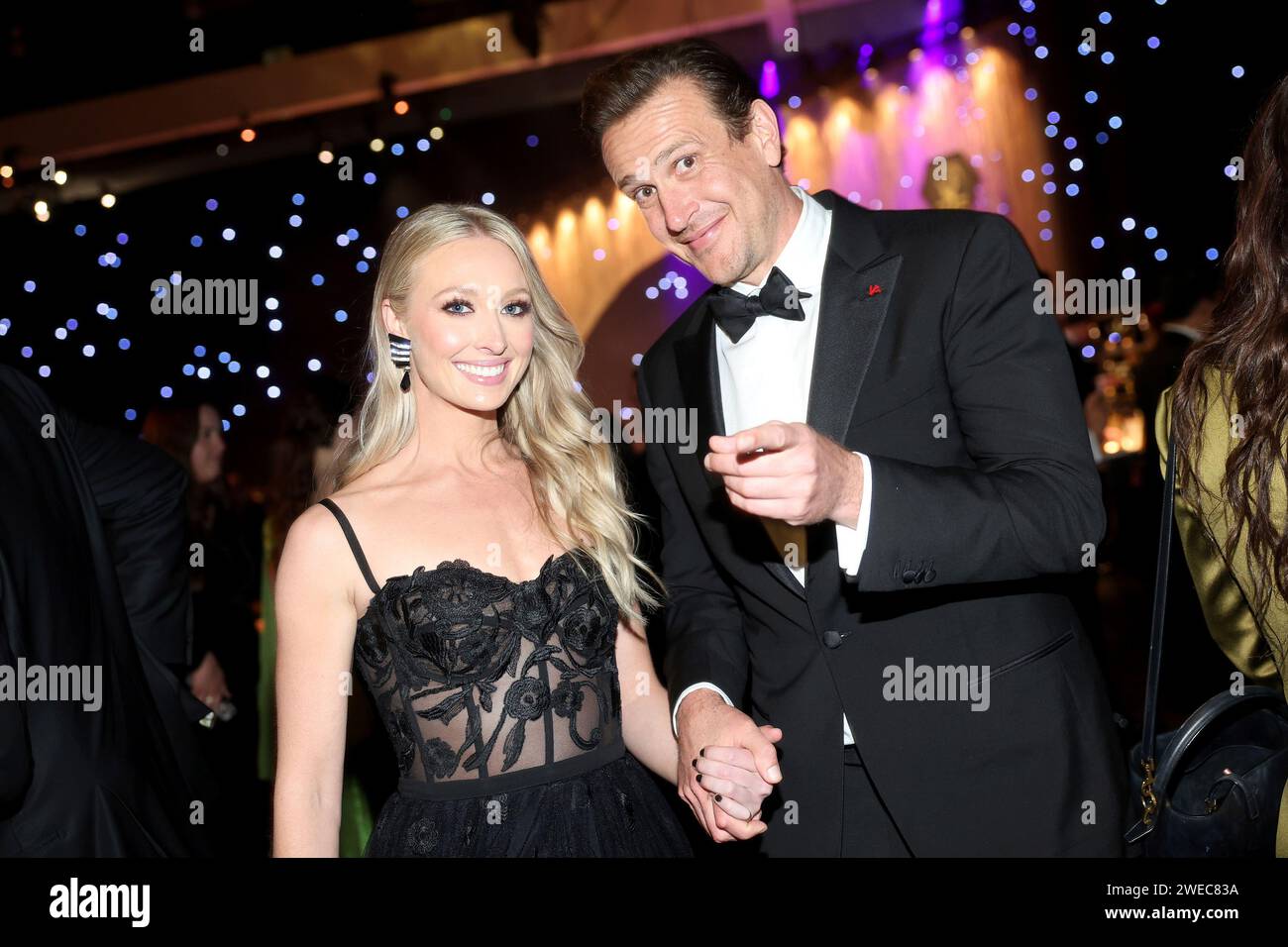 Kayla Radomski, left, and Jason Segel celebrate the 75th Emmy® Awards ...