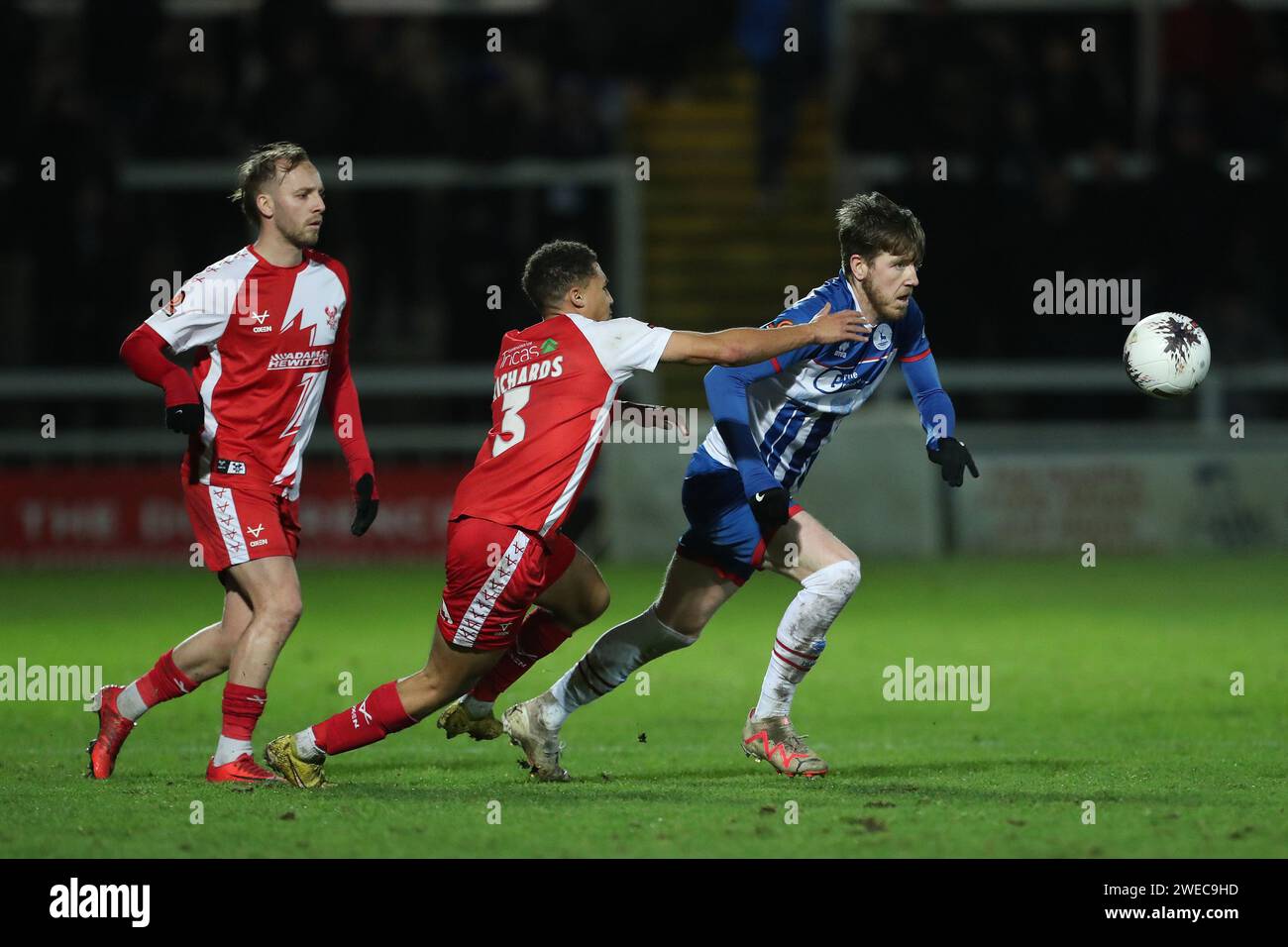 Tom Crawford of Hartlepool United in action with Caleb Richards of ...