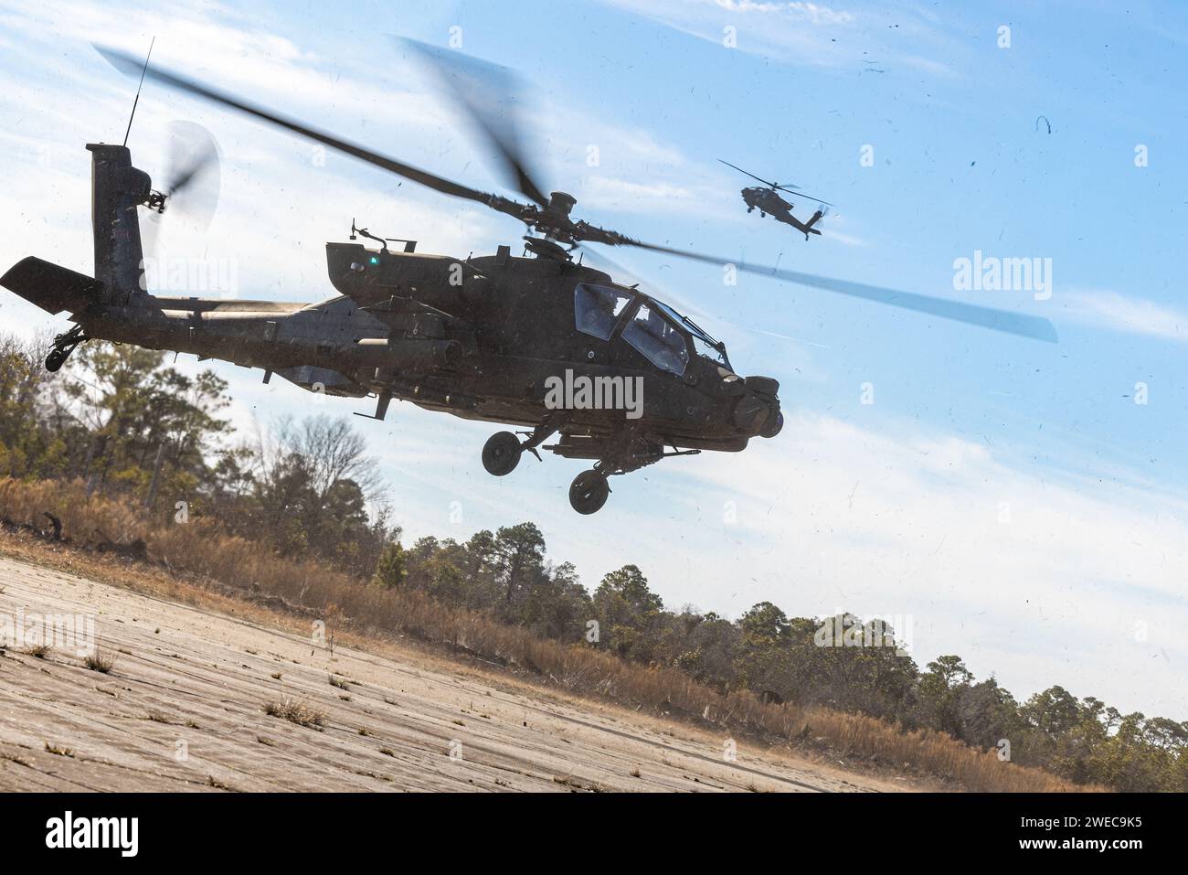 U.S. Army AH-64E Apache helicopters come in to land at Marine Corps ...