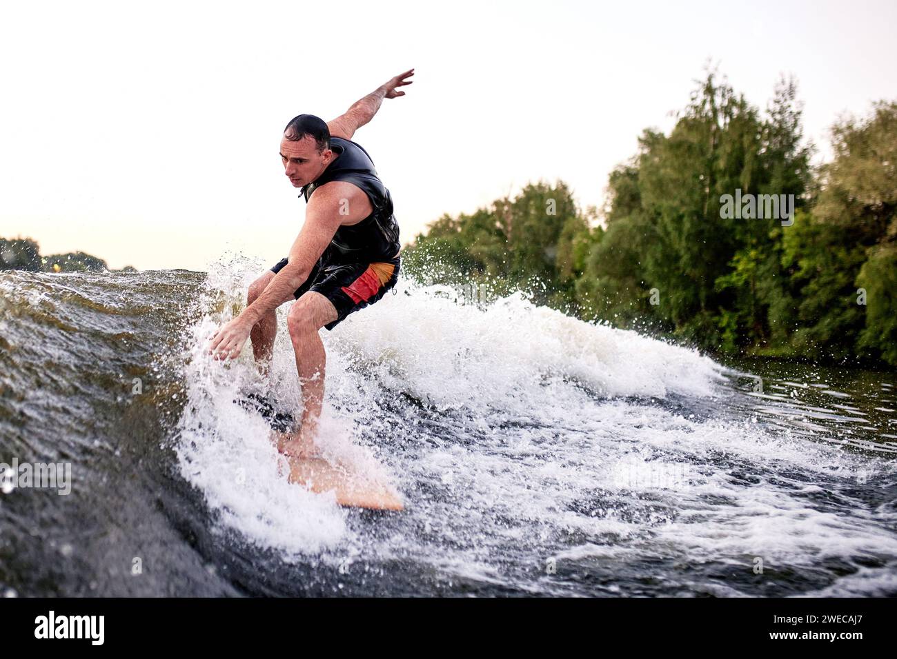 Man wakeboarder glides hi-res stock photography and images - Alamy
