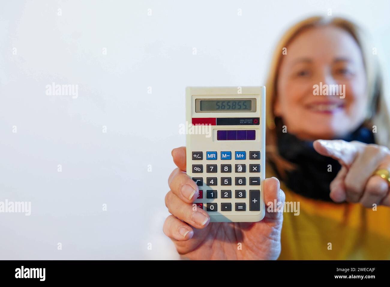 Senior woman showing calendar hi-res stock photography and images - Alamy
