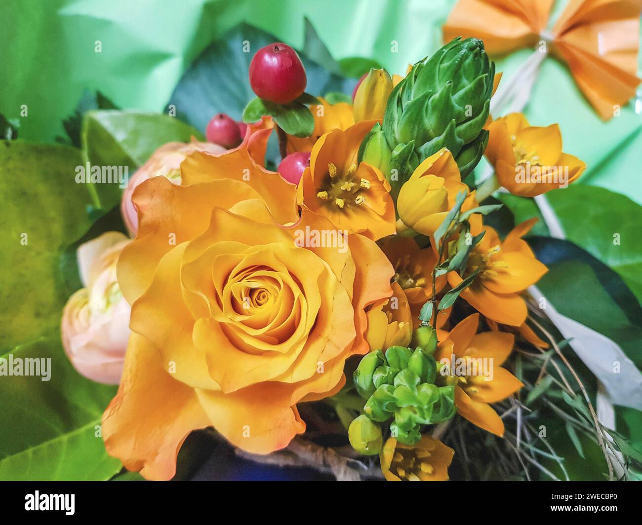 Colorful bouquet with roses, St. John's wort and milk star Stock Photo ...