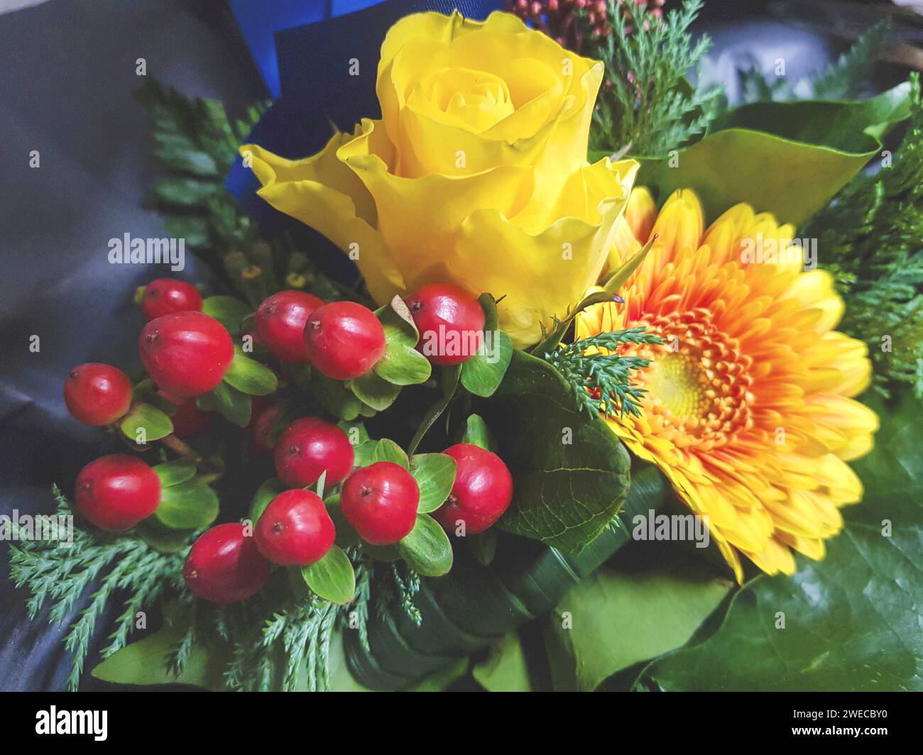 Colorful bouquet with roses, gerberas and St. John's wort Stock Photo ...
