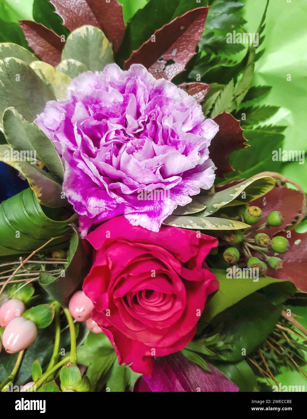 Colorful bouquet with roses, carnations and St. John's wort Stock Photo ...