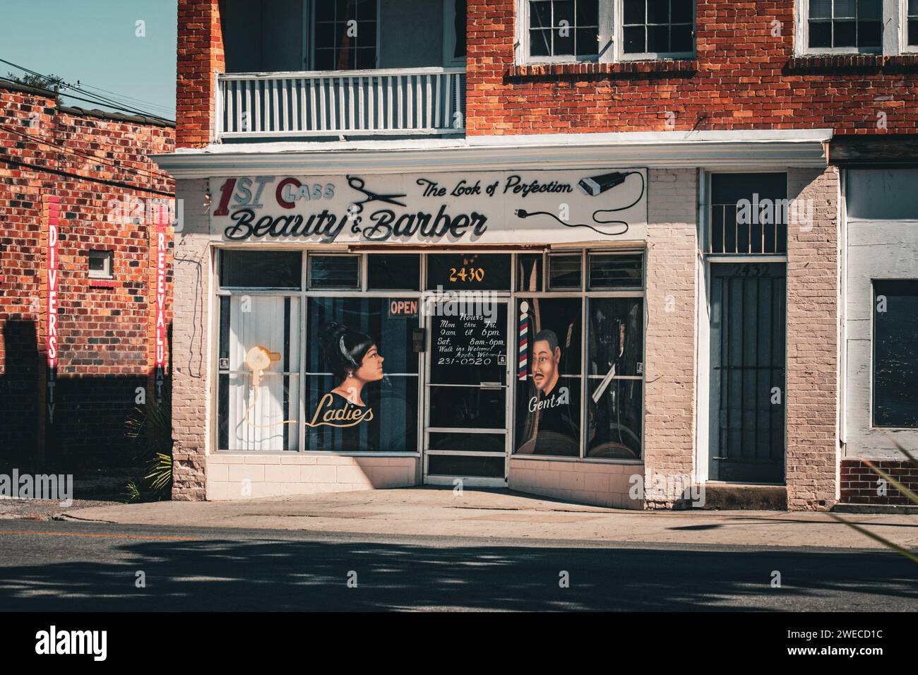 Facade of an African American Barbershop in Savannah Georgia with Hand ...