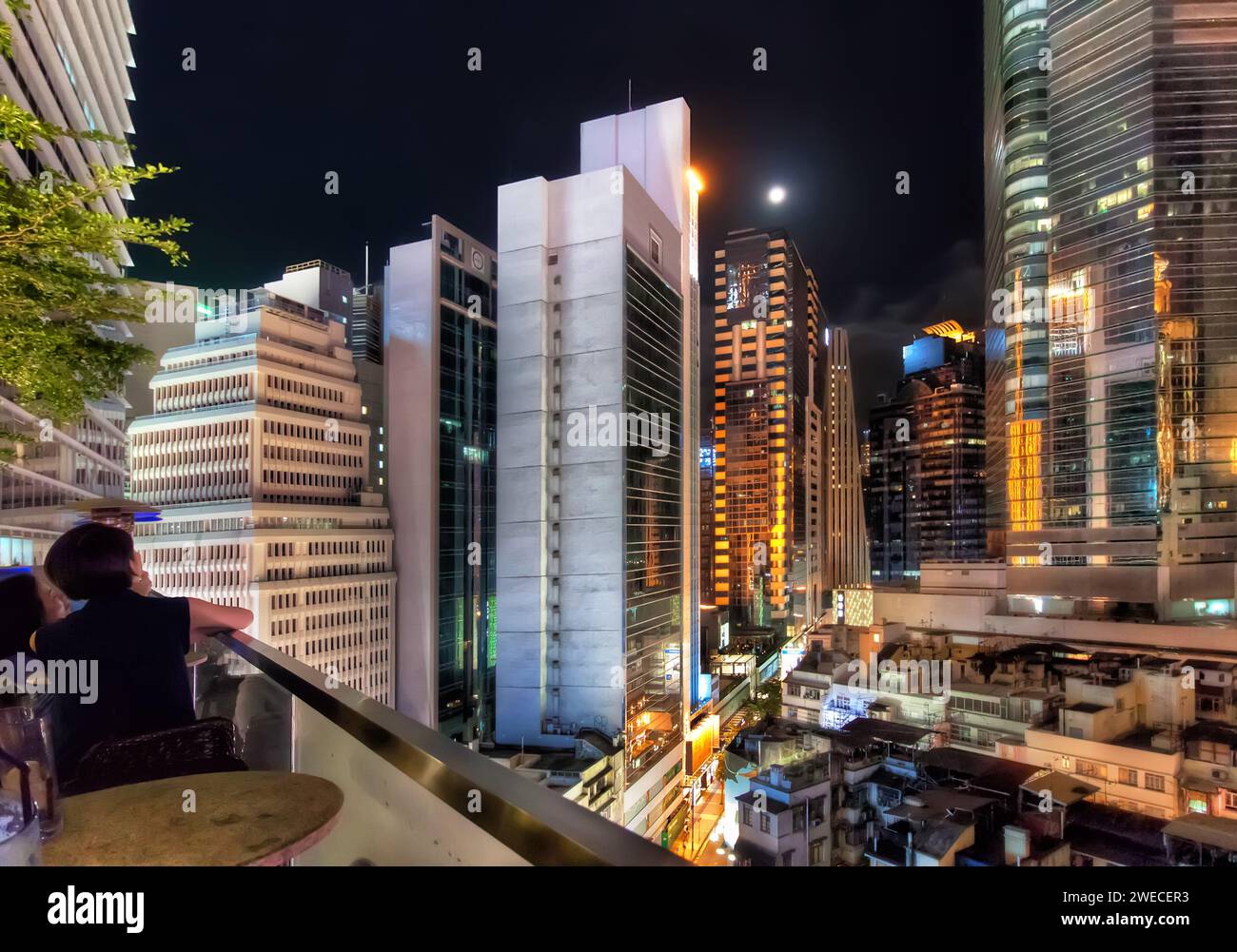 Evening Cocktails on Rooftop Bar with Modern Asian Skyscrapers ...