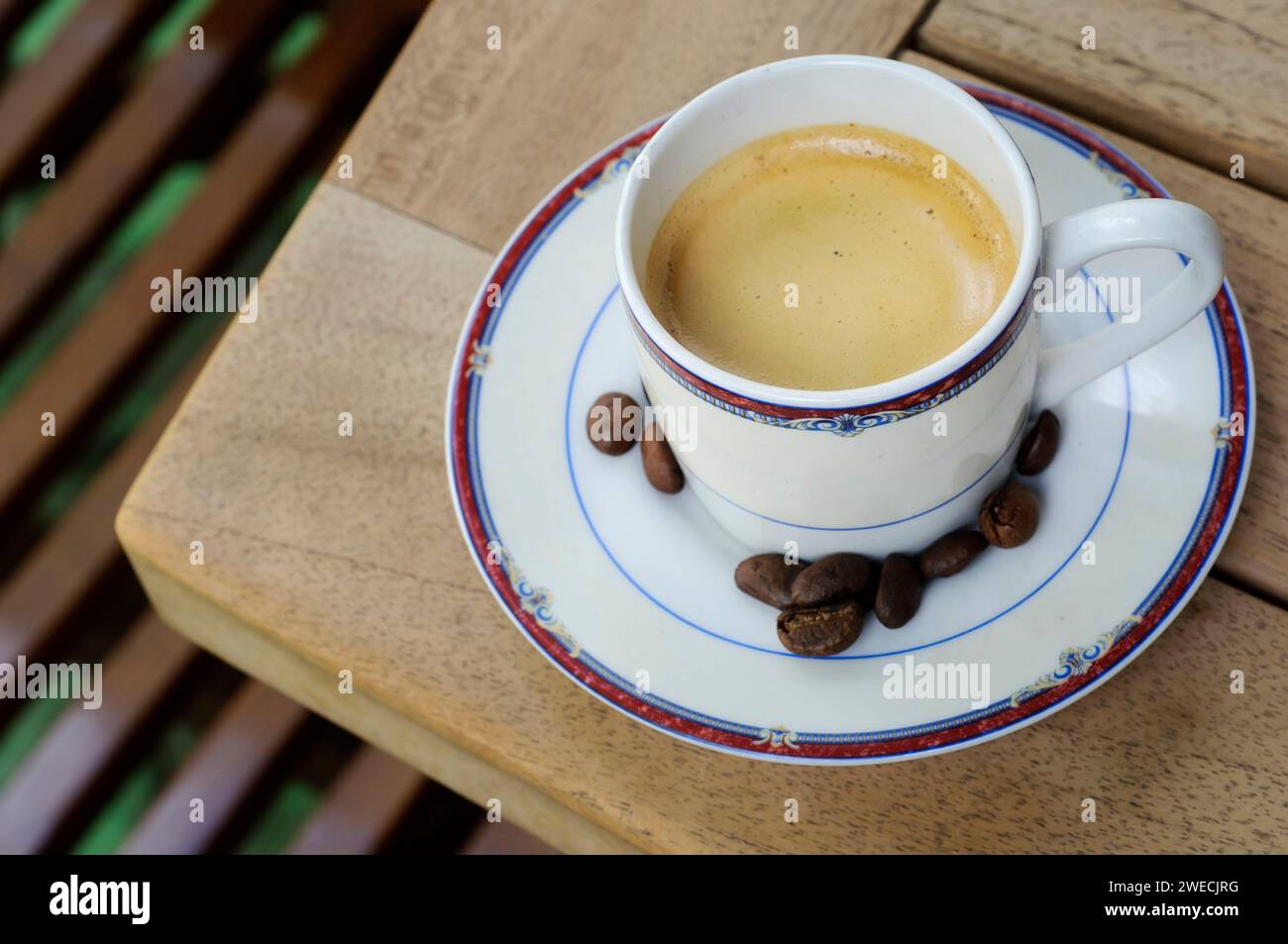 Espresso is a type of coffee produced by extracting ground coffee beans ...