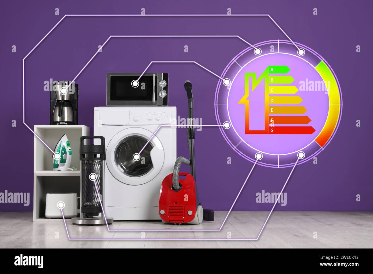 Energy efficiency rating label and different household appliances near ...