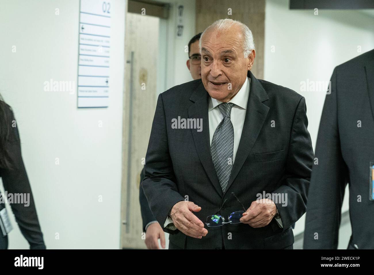 Minister of Foreign Affairs of Algeria Ahmed Attaf (C) walks in hallway ...