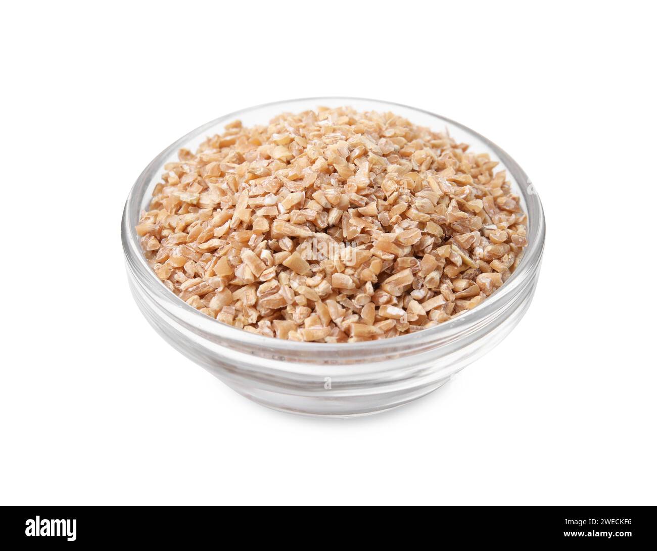 Dry wheat groats in glass bowl isolated on white Stock Photo - Alamy
