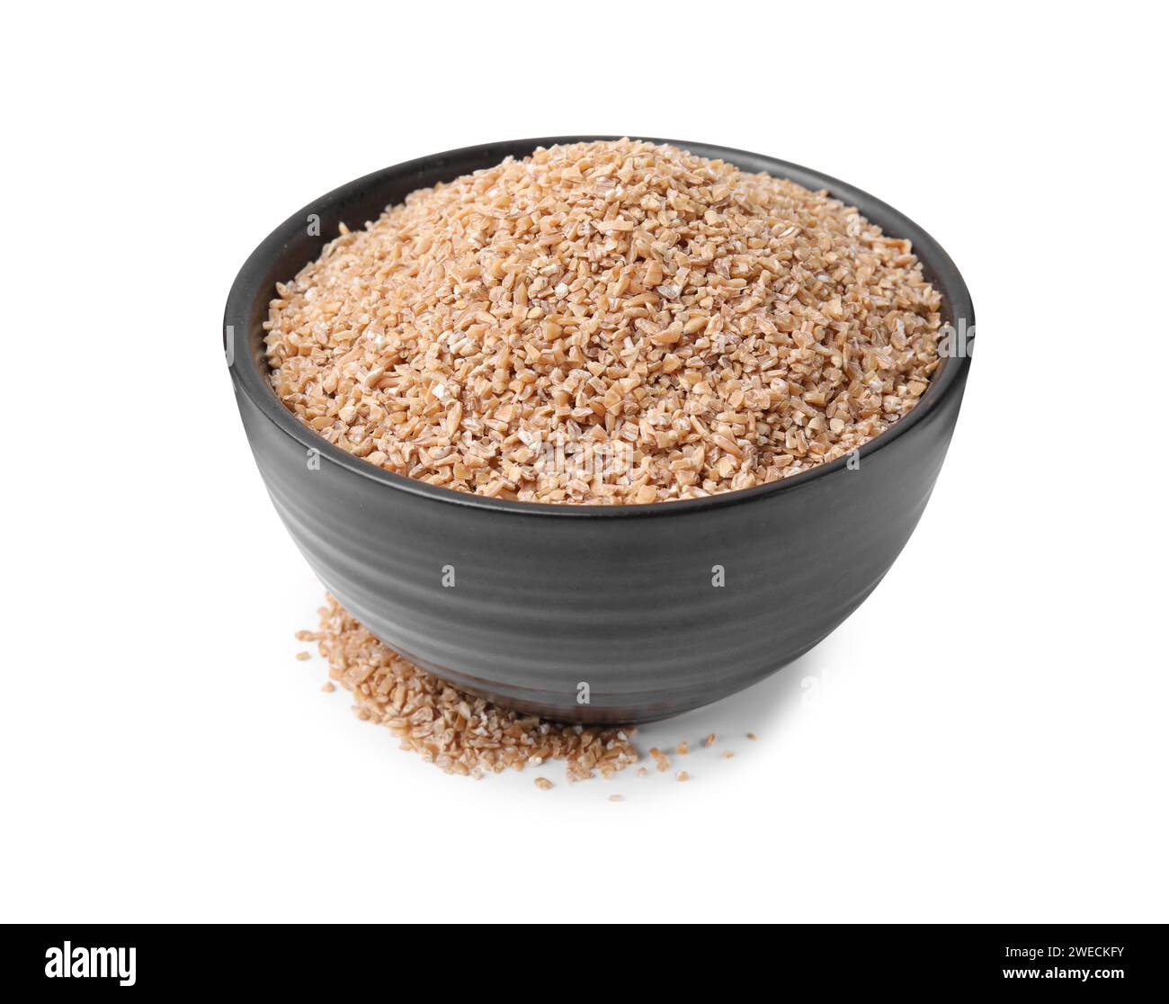 Dry wheat groats in bowl isolated on white Stock Photo - Alamy
