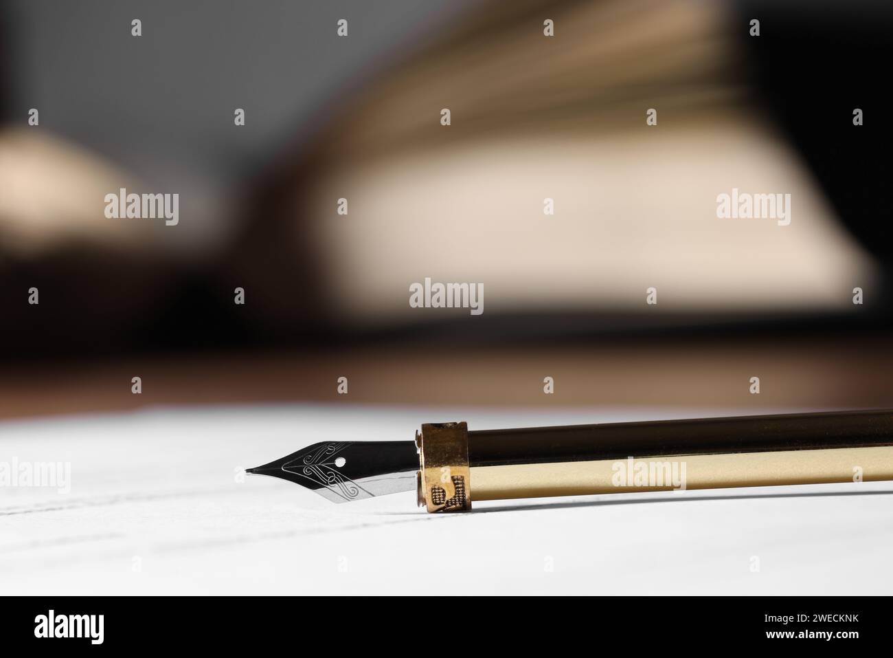 Fountain pen and paper document on table, closeup. Notary service Stock ...