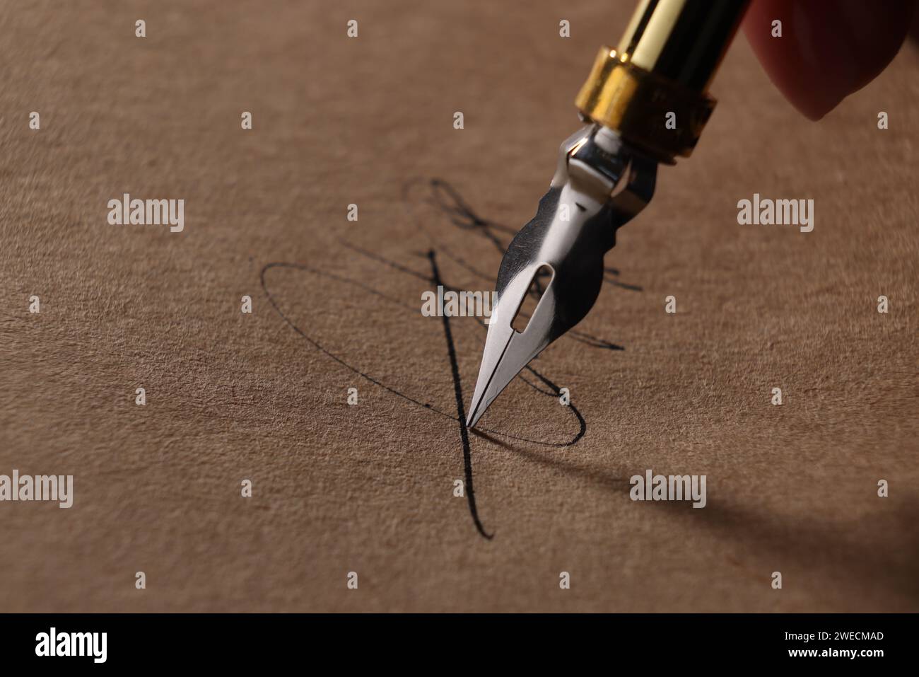 Woman signing on sheet of paper with fountain pen, closeup. Space for ...