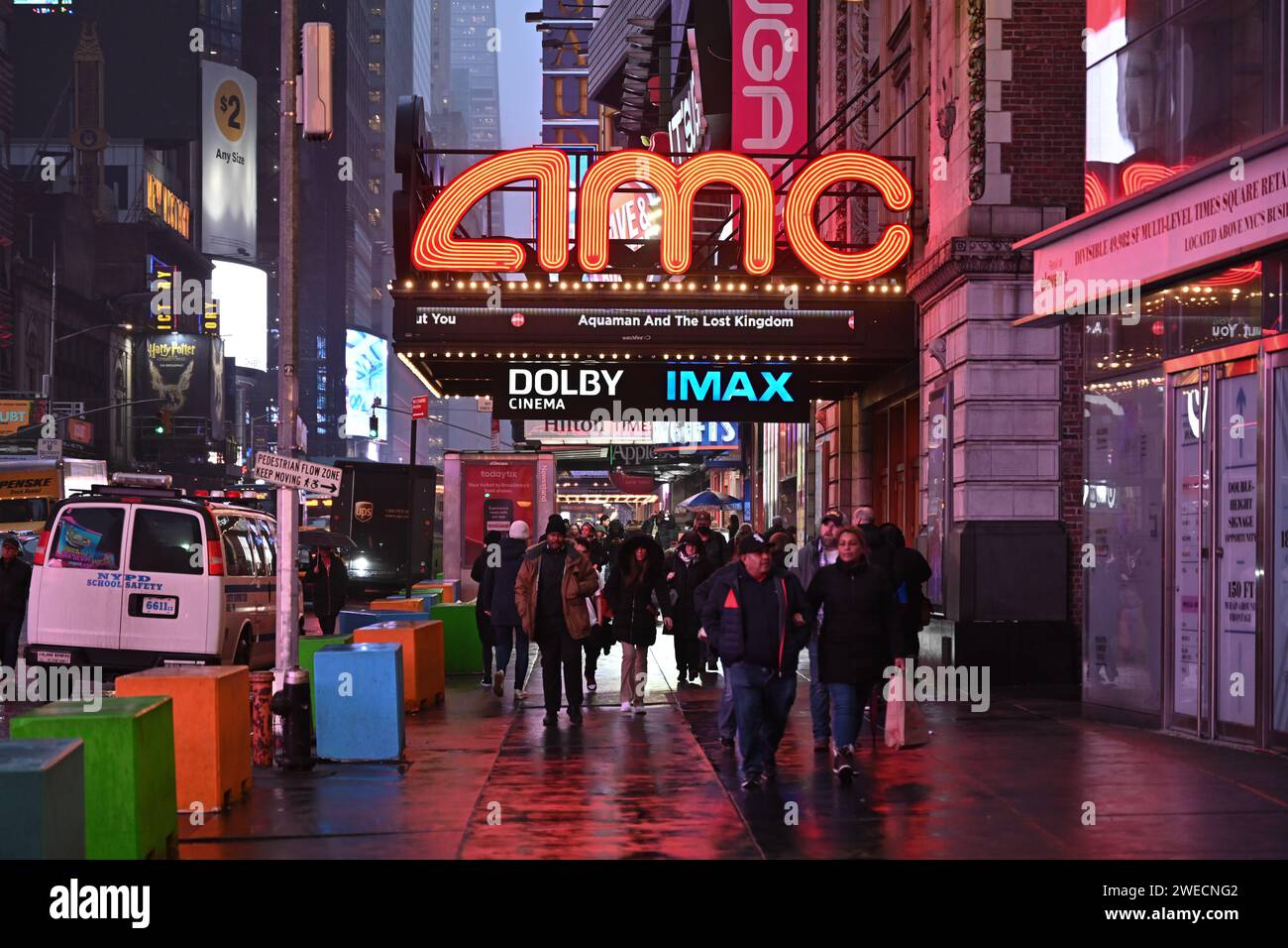 People walk by the AMC Empire 25 movie theater in Times Square on ...