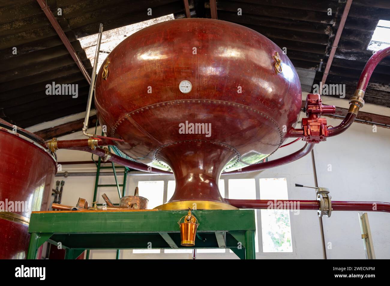 Double distillation process of cognac spirit in Charentias copper still ...