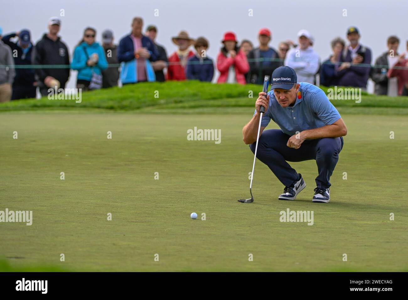 LA JOLLA, CA - JANUARY 24: Justin Rose (GBR) lines up his birdie putt ...