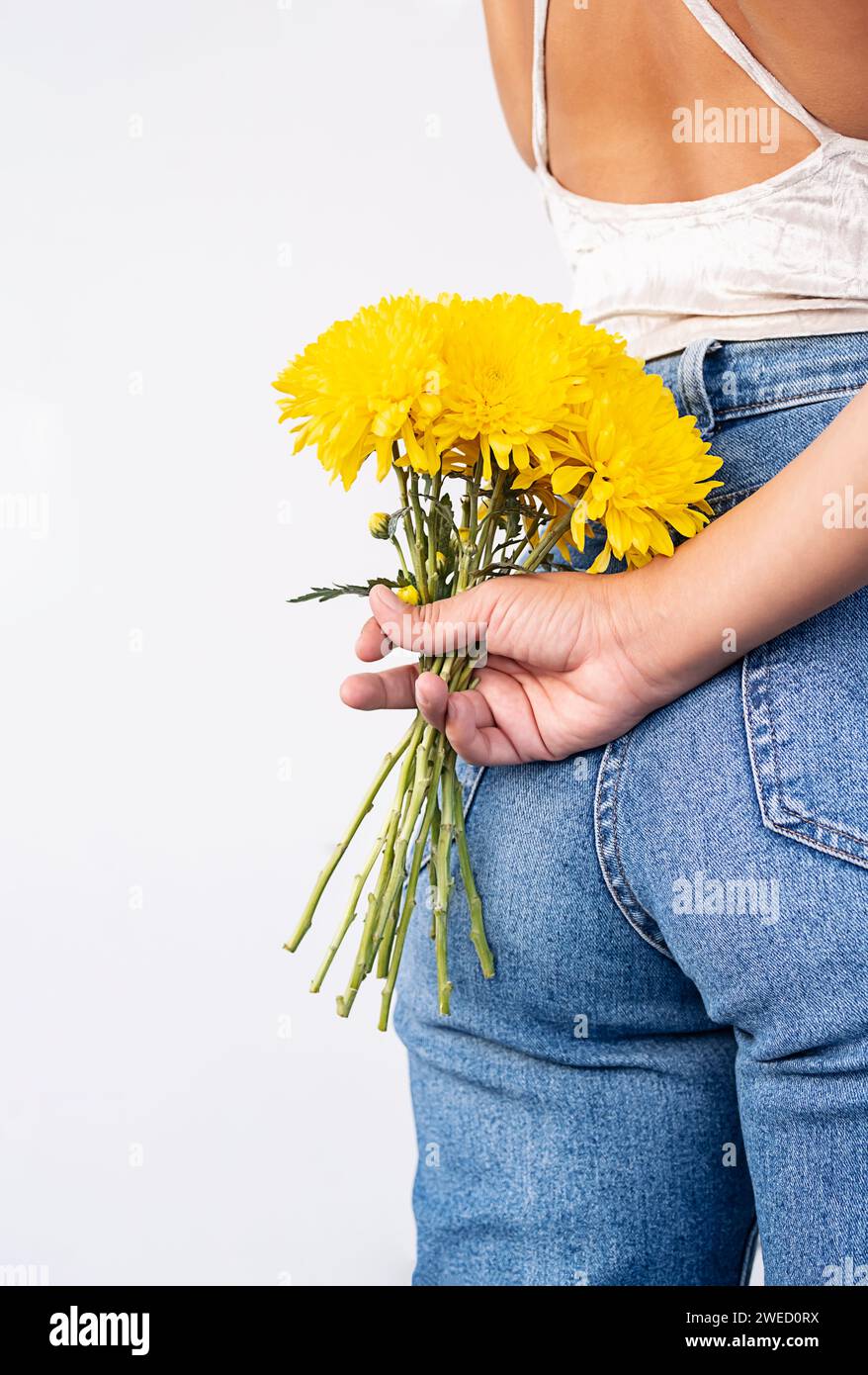 Woman hiding behind bunch hi-res stock photography and images - Alamy
