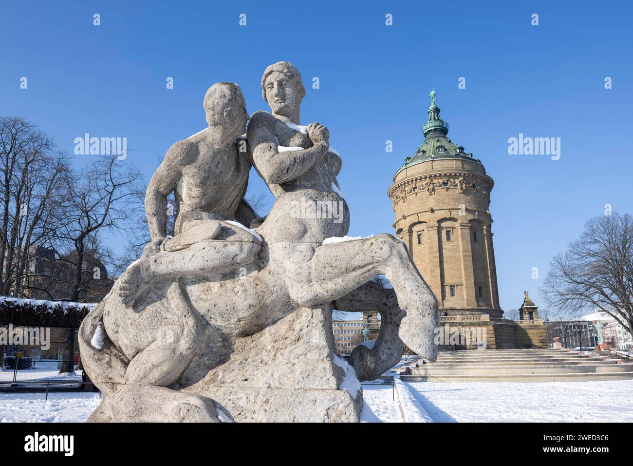 Snow-covered sandstone figures from Greek mythology in front of the ...