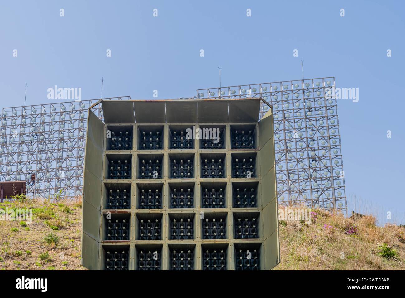 Military array of loud speakers and spot lights on hill overlooking DMZ ...