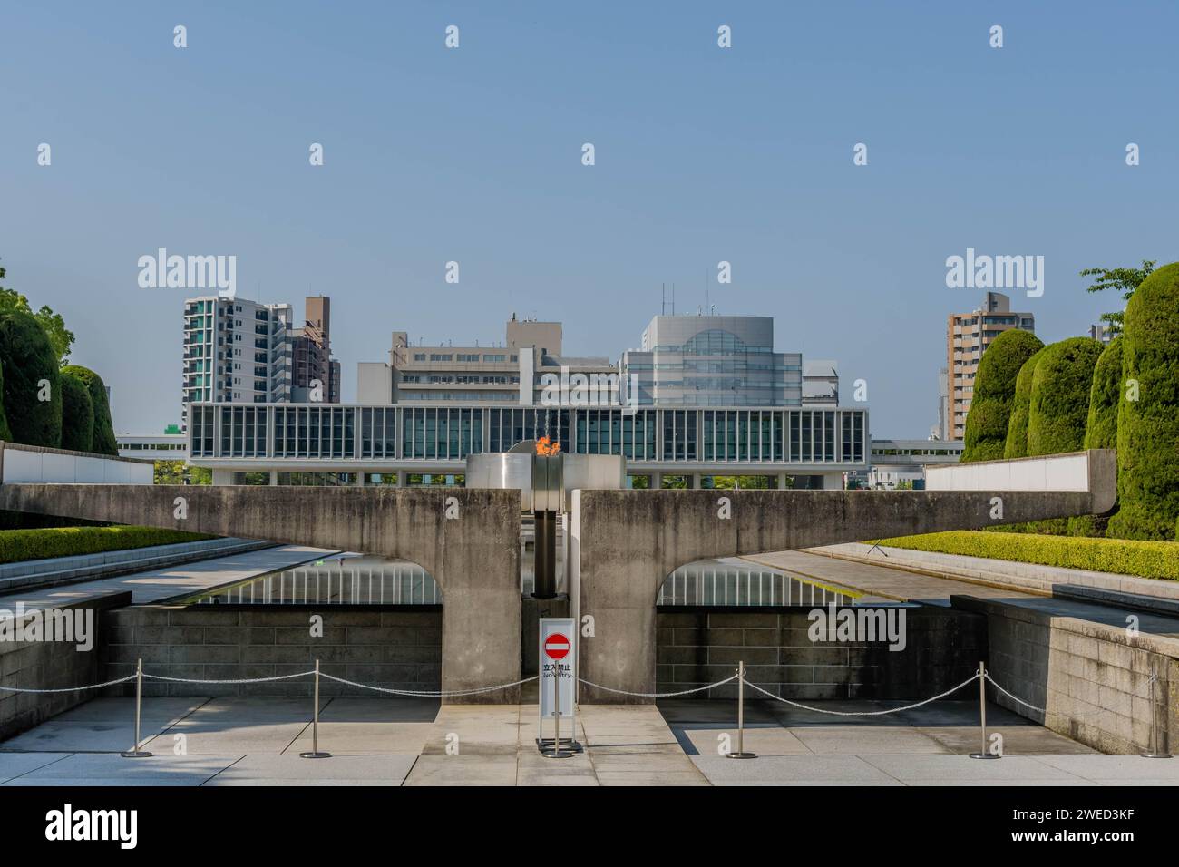 Peace Fire at Memorial Park with city buildings in background in ...