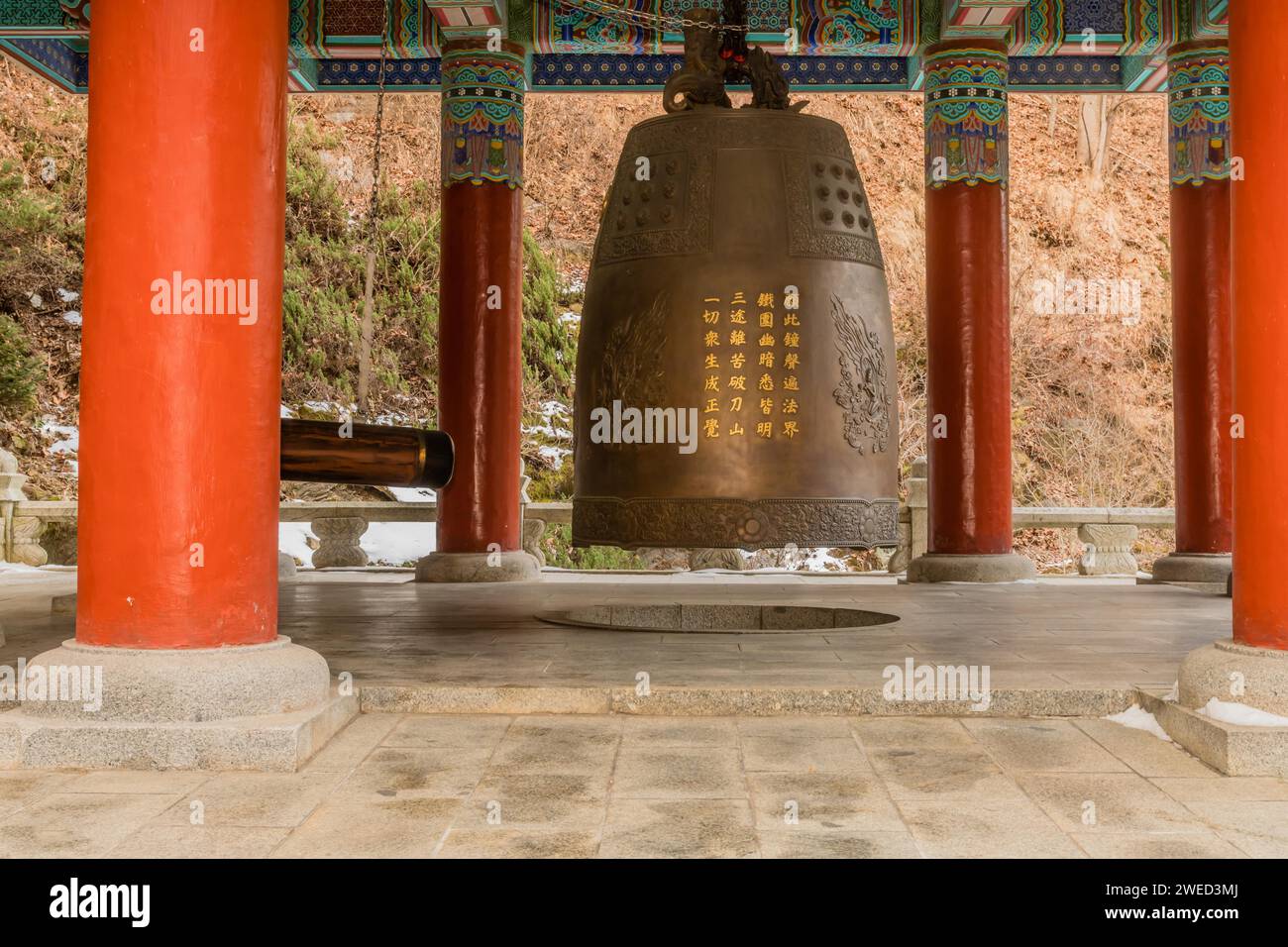 Giant brass bell in colorful pavilion at Guinsa temple in South Korea ...