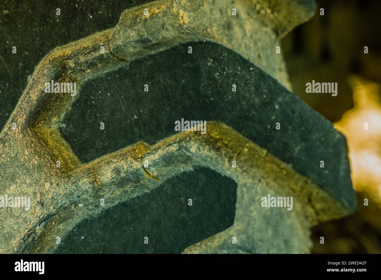 Closeup of tire tread of industrial heavy equipment roadwork machine ...