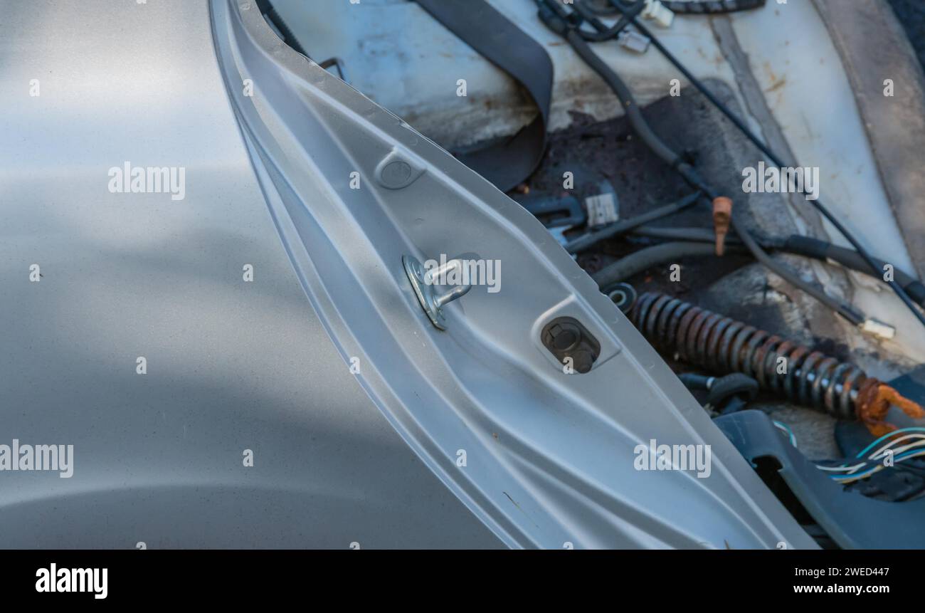 Side view of wreaked car with focus on door catch bracket Stock Photo ...