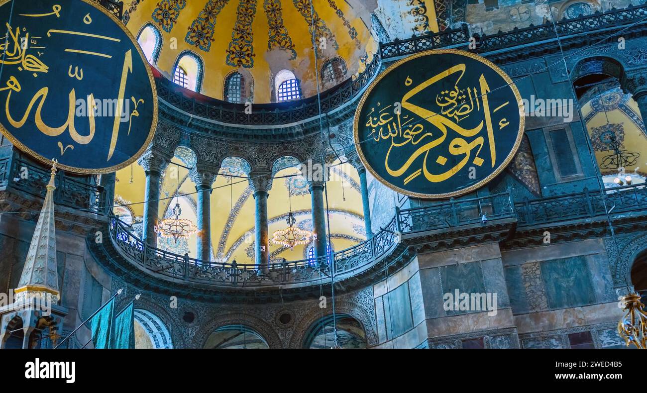 Medallions with Arabic script hanging on wall inside Hagia Sophia ...