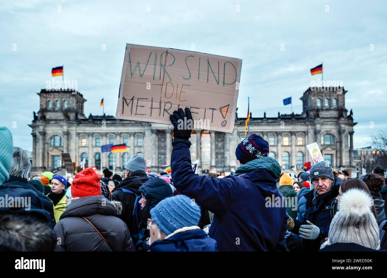 Around 100, 000 people gathered in front of the Bundestag on Sunday to ...