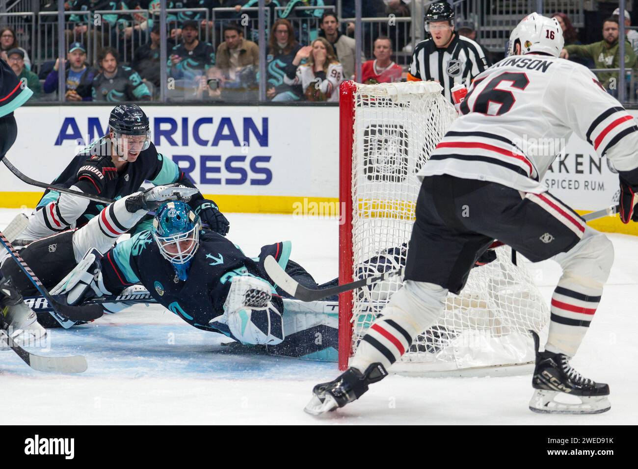 Seattle Kraken goaltender Joey Daccord (35) makes a save as Chicago ...