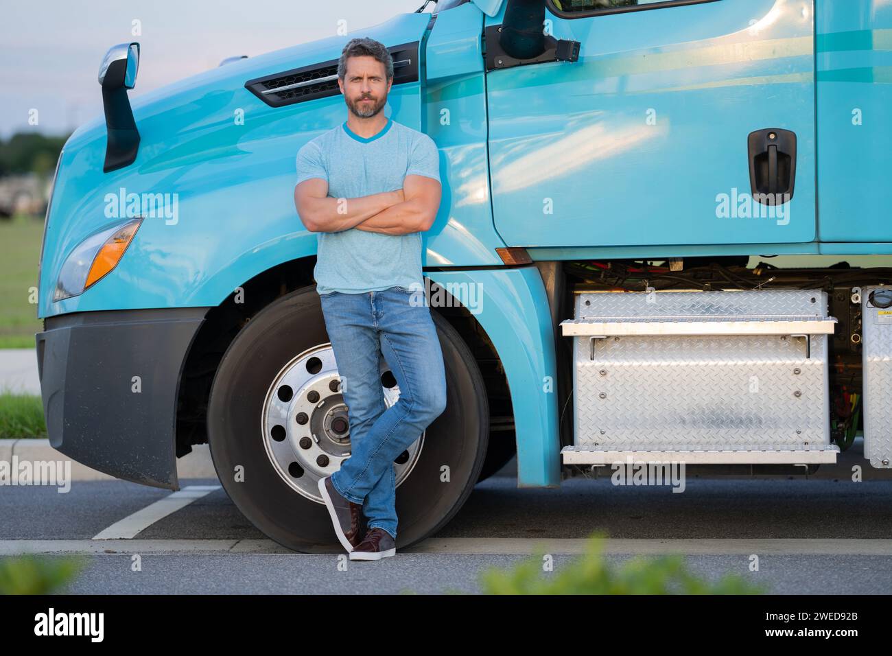 Hispanic driver near lorry truck. Man owner truck driver. Handsome ...