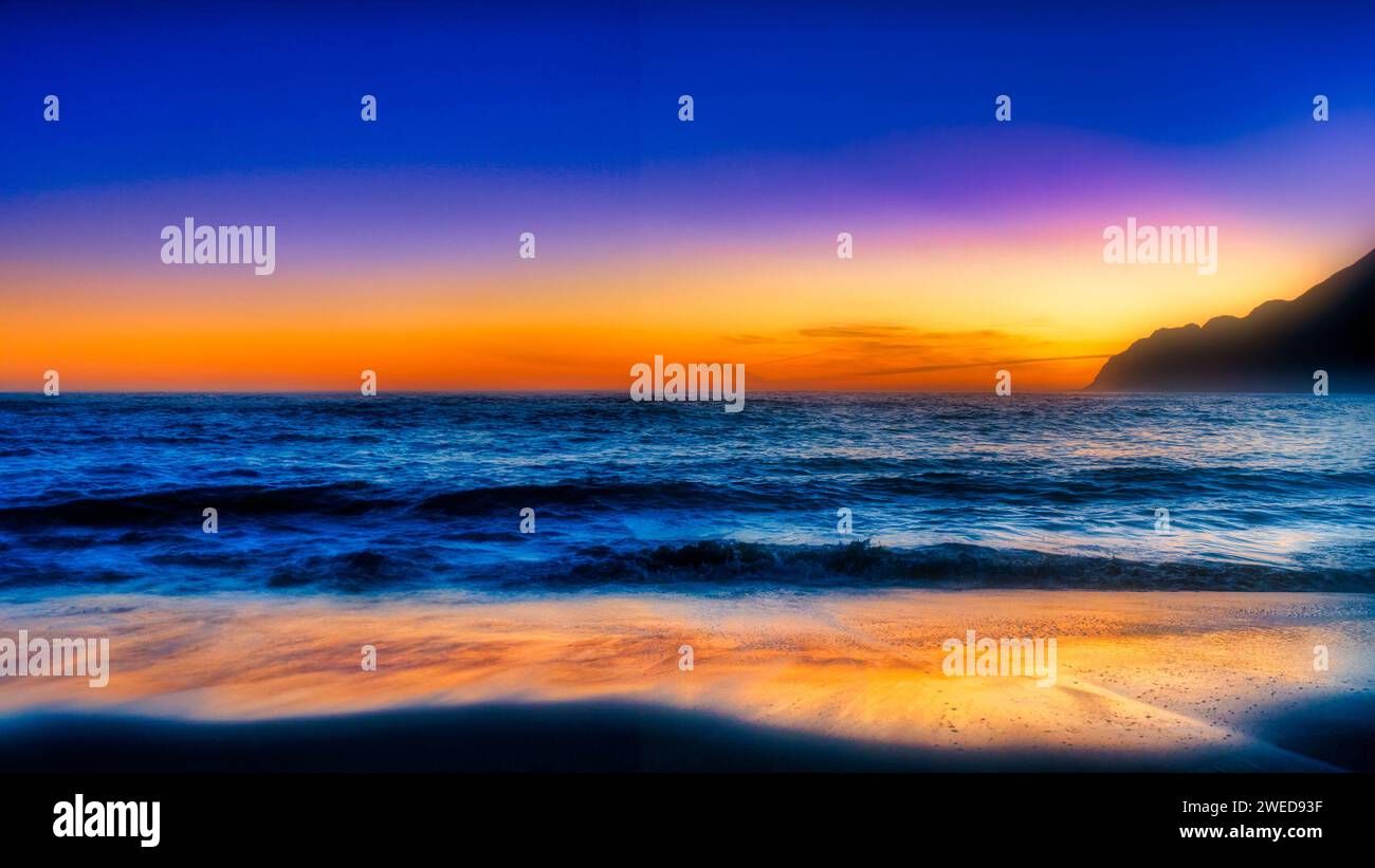 the colours of sunset mirrored on the sea at White rock beach Stock ...
