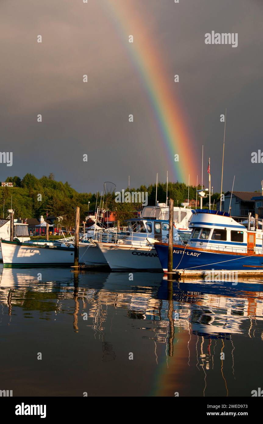 Fishing boats in harbor with rainbow, Ilwaco, Washington Stock Photo ...