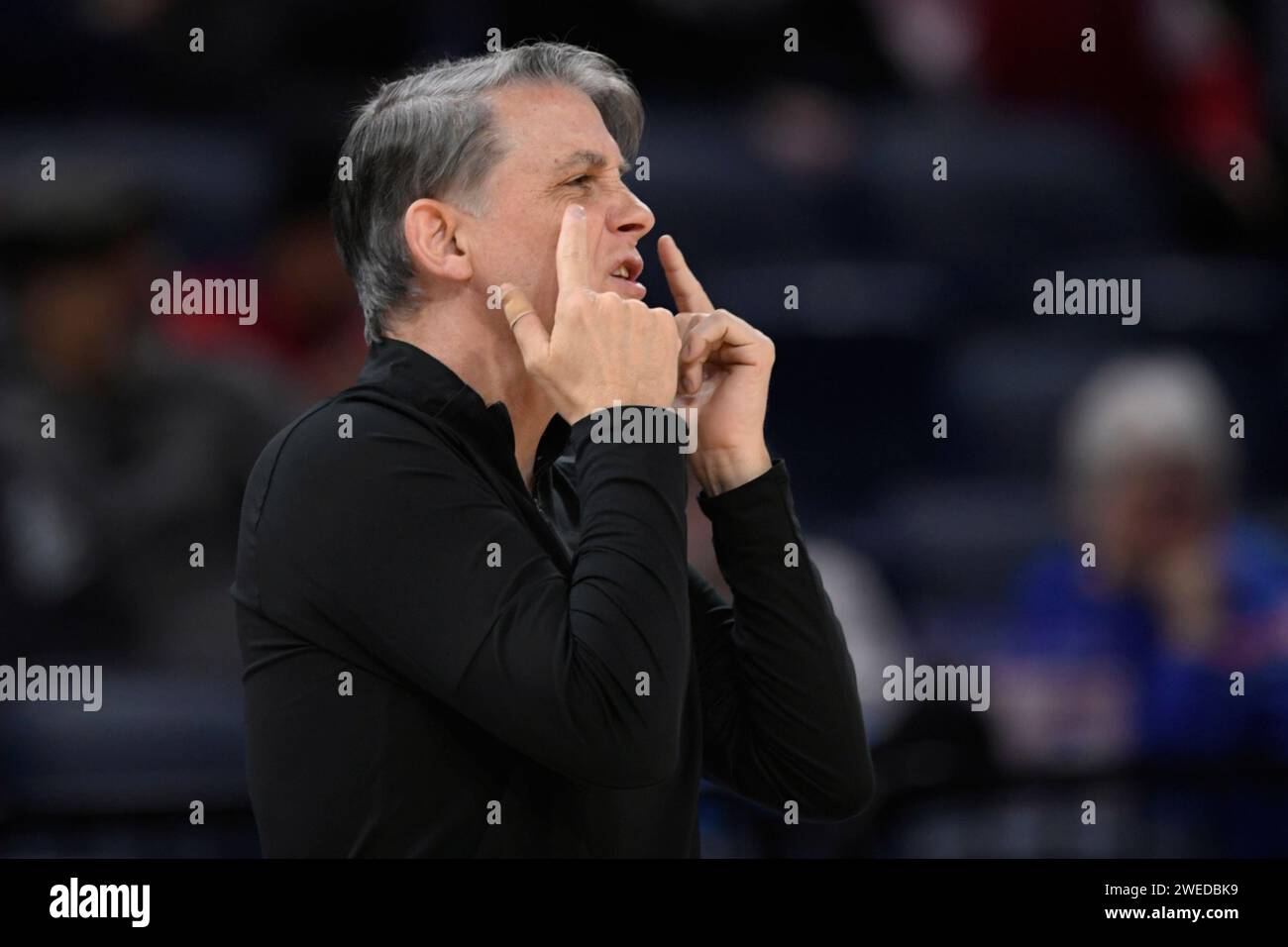 DePaul interim head coach Matt Brady yells to his players during the second half of an NCAA ...