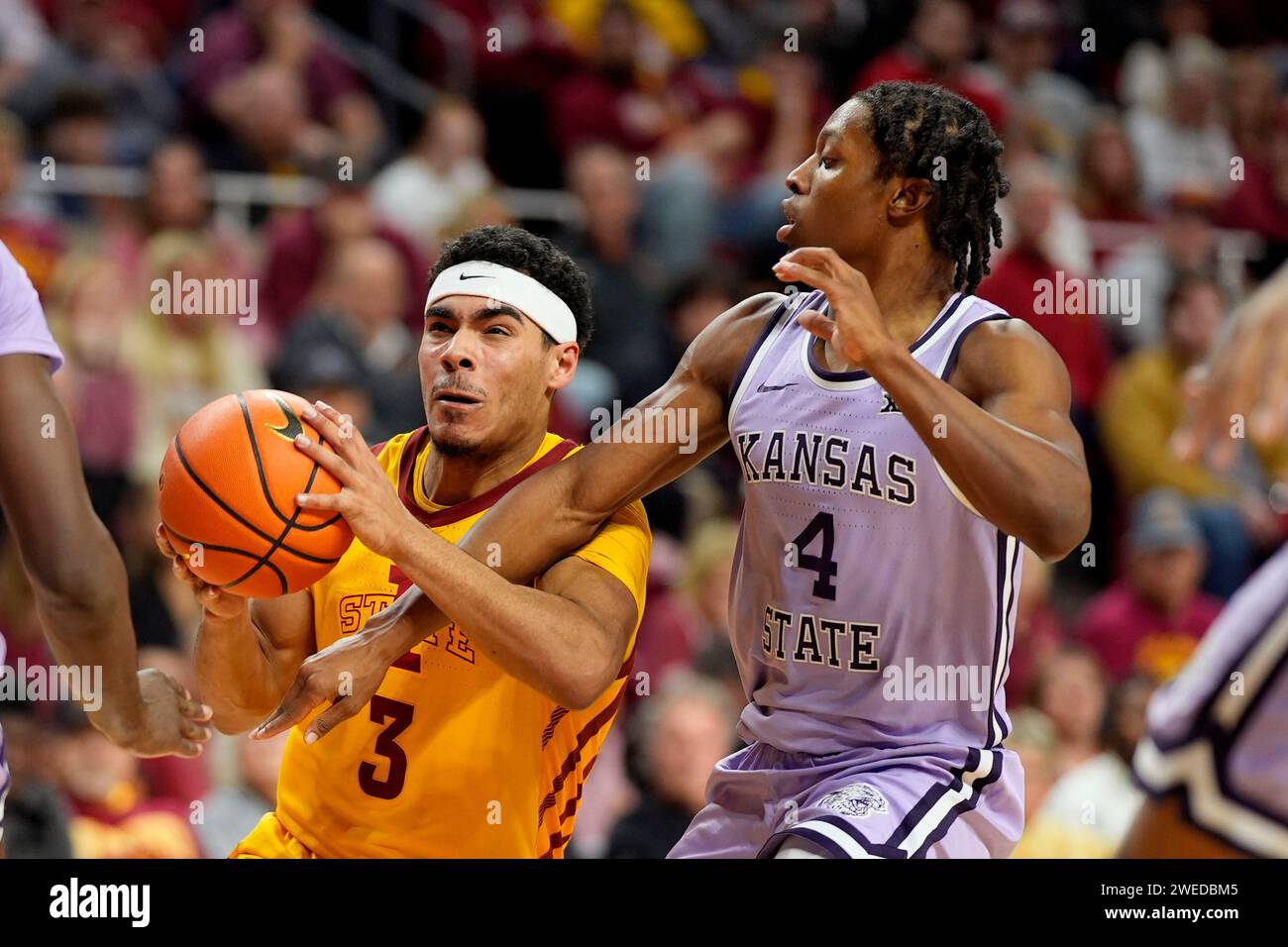 Iowa State guard Tamin Lipsey (3) is fouled by Kansas State guard Dai ...