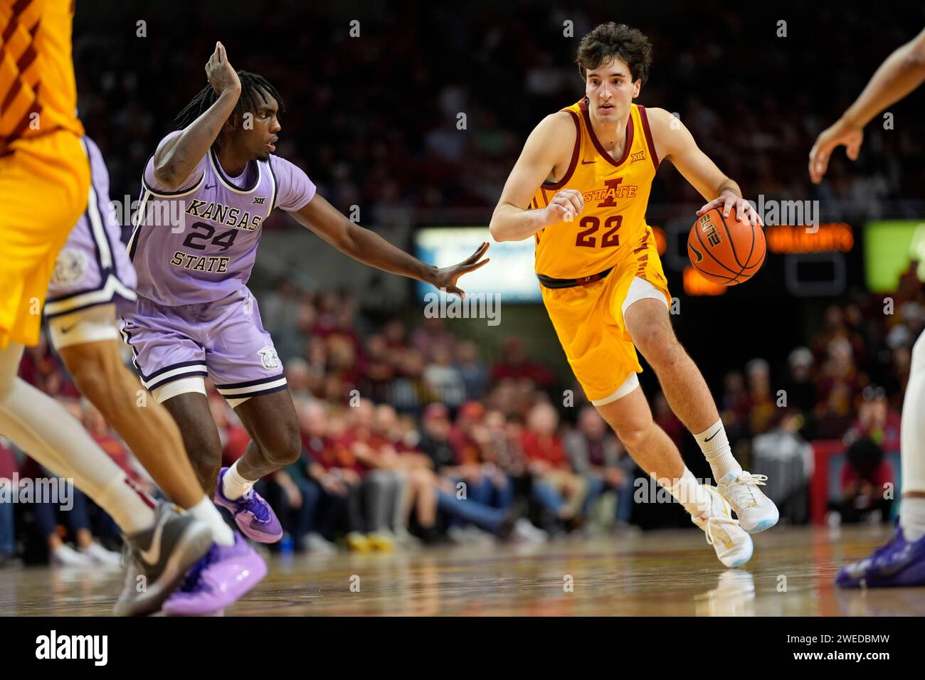 Iowa State forward Milan Momcilovic (22) drives past Kansas State ...