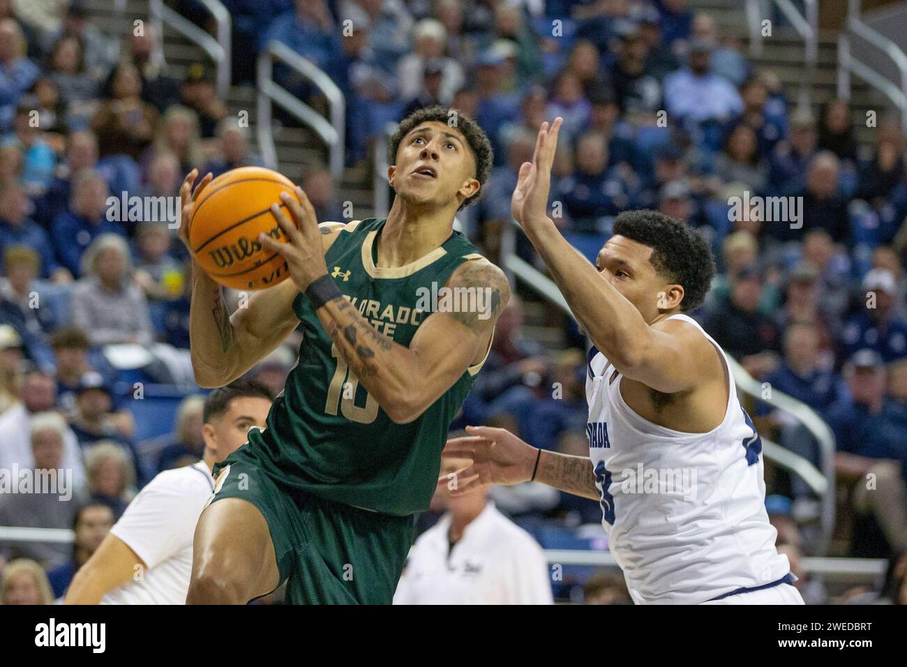 Colorado State guard Nique Clifford (10) shoots over Nevada forward ...