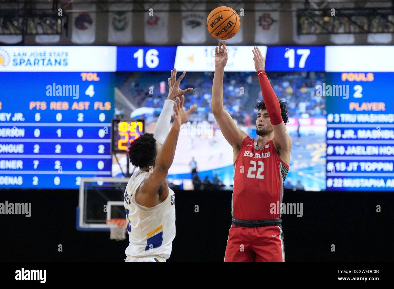New Mexico forward Mustapha Amzil (22) shoots a 3-point basket over San ...