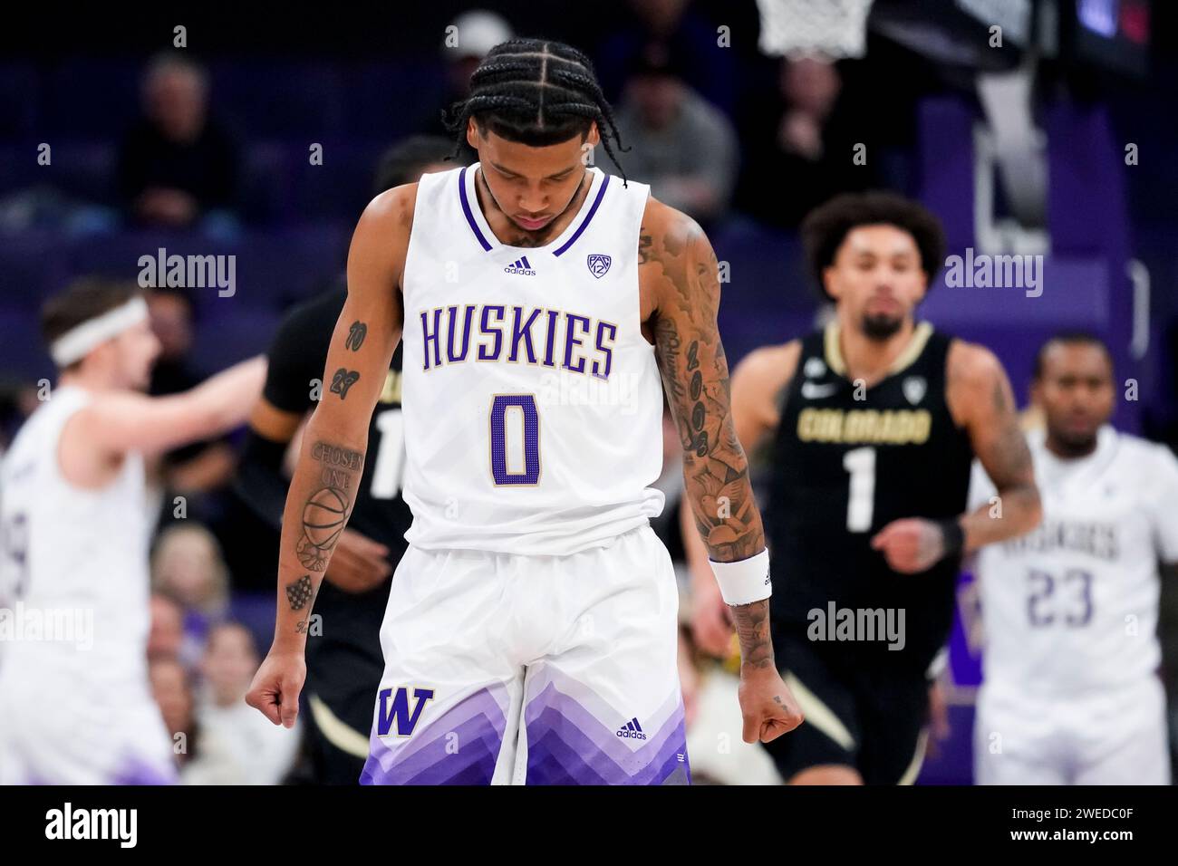 Washington guard Koren Johnson (0) looks down after being called for a ...