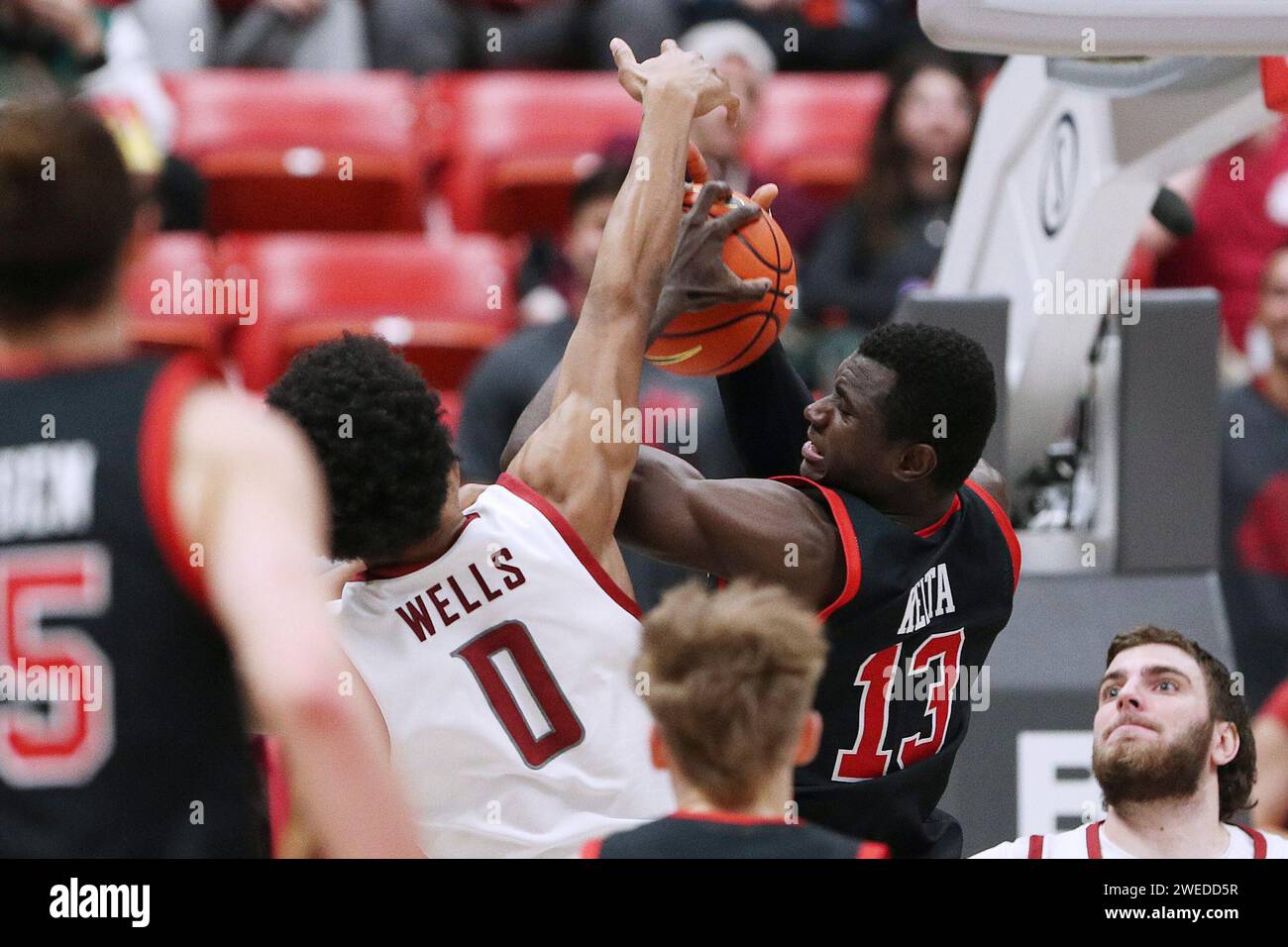 Utah center Keba Keita (13) grabs a rebound next to Washington State ...