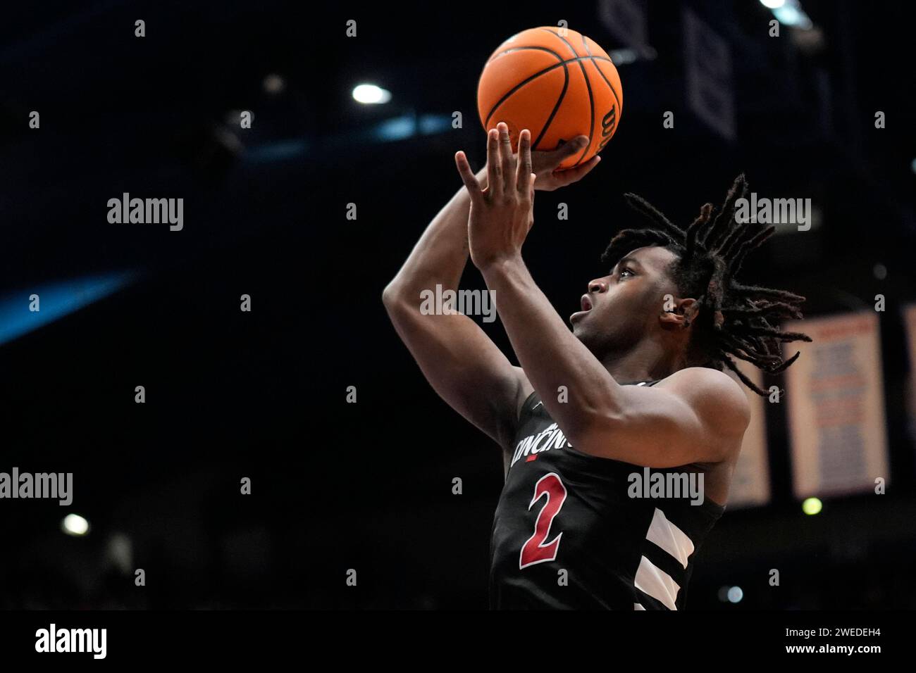 Cincinnati guard Jizzle James shoots during the second half of an NCAA ...