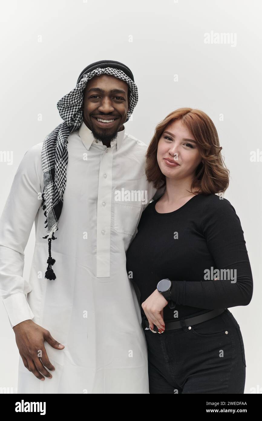 Muslim entrepreneur and a contemporary red-haired girl strike a pose ...