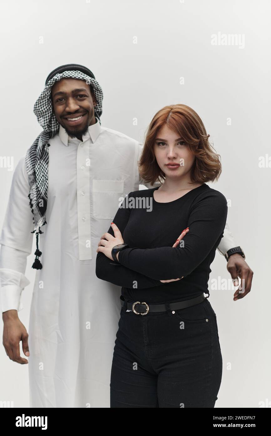 Muslim entrepreneur and a contemporary red-haired girl strike a pose ...